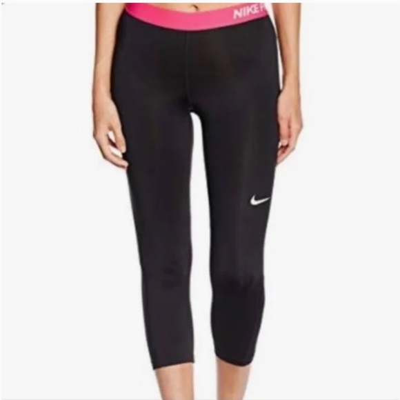 Nike | Pants & Jumpsuits | Nike Pro Drifit Cropped Capris With Pink ...